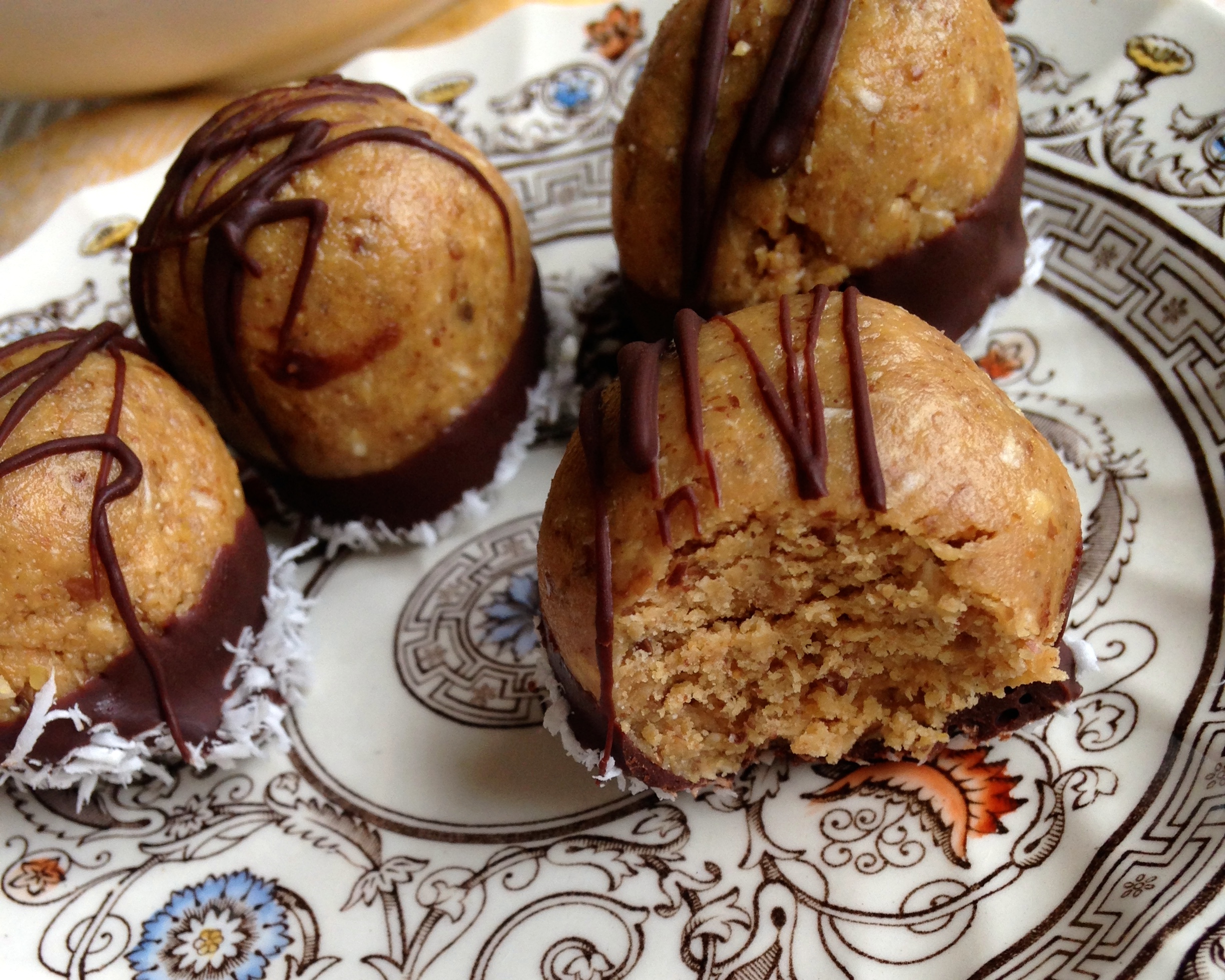 Purely Decadent Peanut Butter Coconut Balls | skinnysweettreats